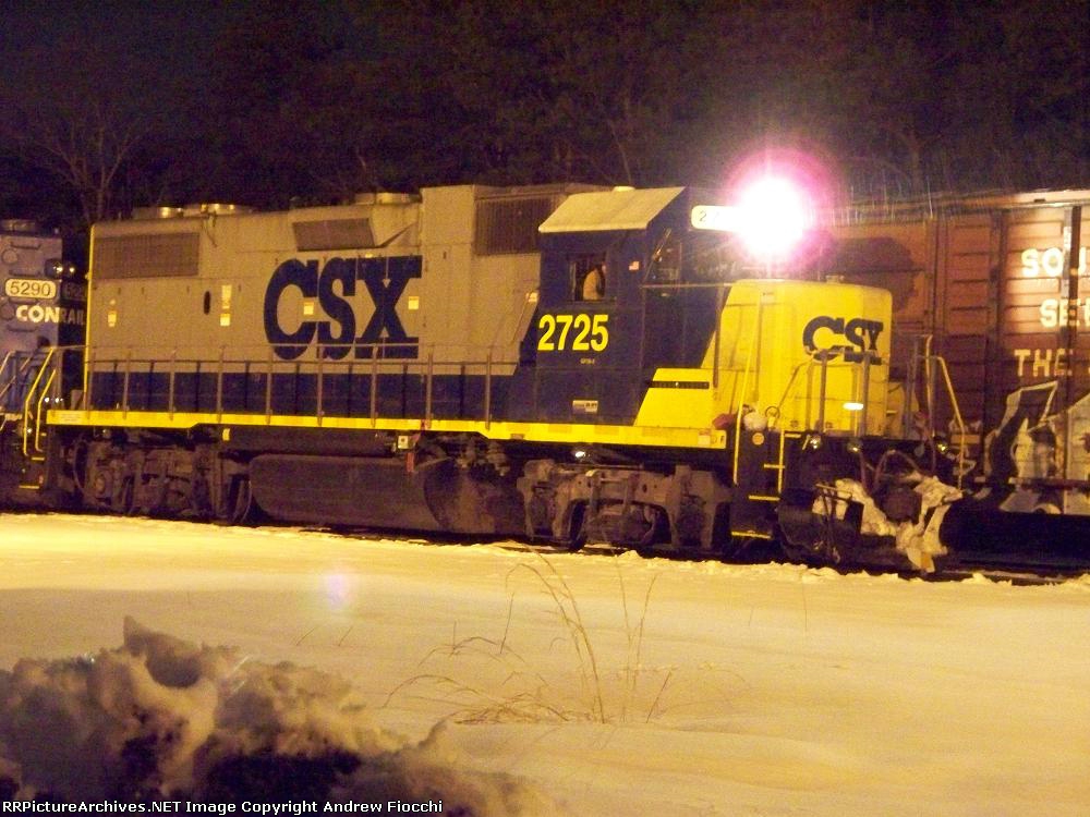 CSX 2725 DOING SOME WORK IN MILLVILLE RAILROAD YARD AT NIGHT IN THE SNOW